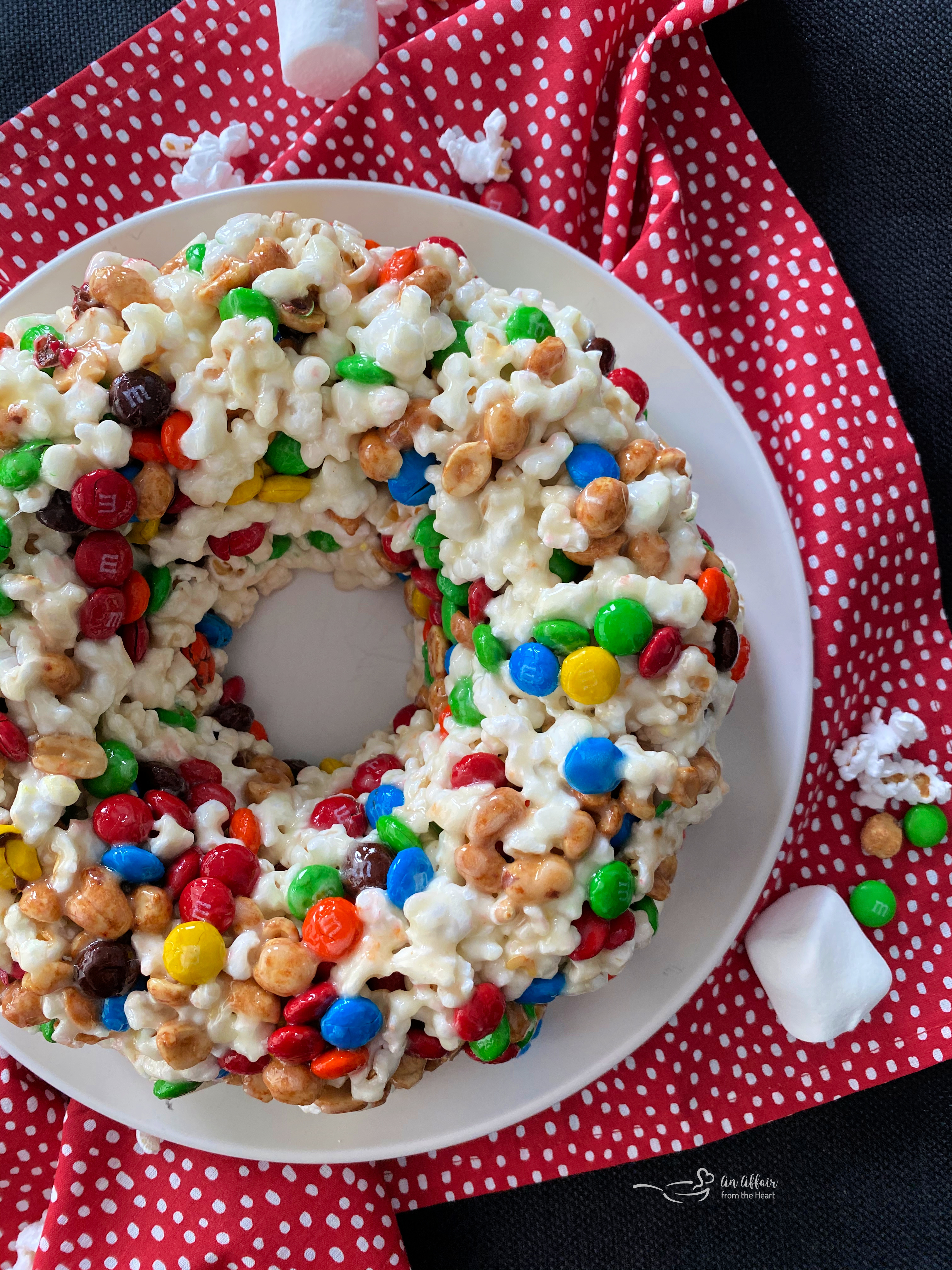 Easy No Bake Popcorn Cake with Marshmallows, M&M's and Peanuts