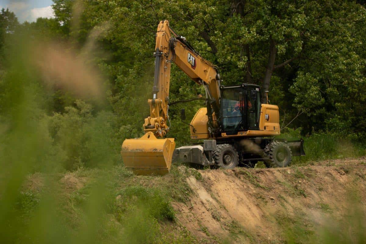 BUILT FOR PERFORMANCE, THE NEW CAT® M320 WHEELED EXCAVATOR OFFERS MORE SWING TORQUE, A LONGER ...