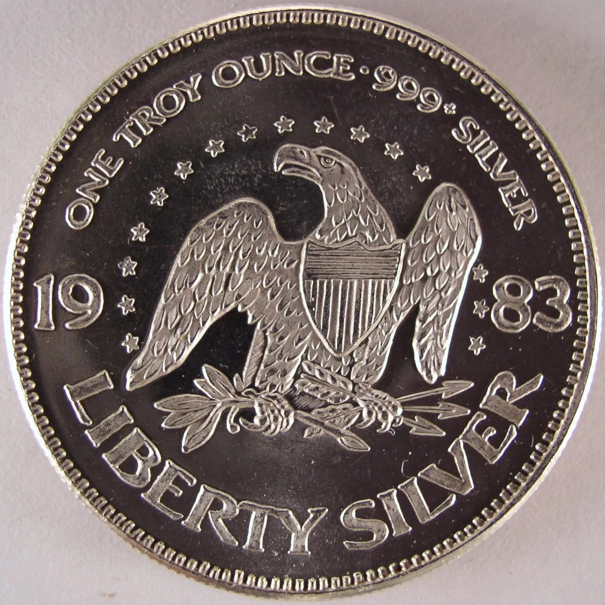 1 OZ .999+ Fine Silver AMark Liberty Round – 1983 | The Mint