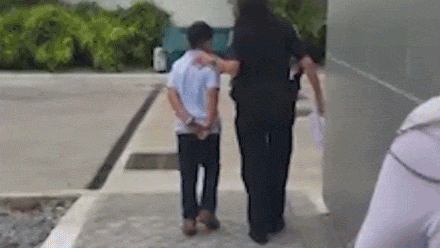 Cops lead boy, 7, away from school in handcuffs for attacking teacher ...