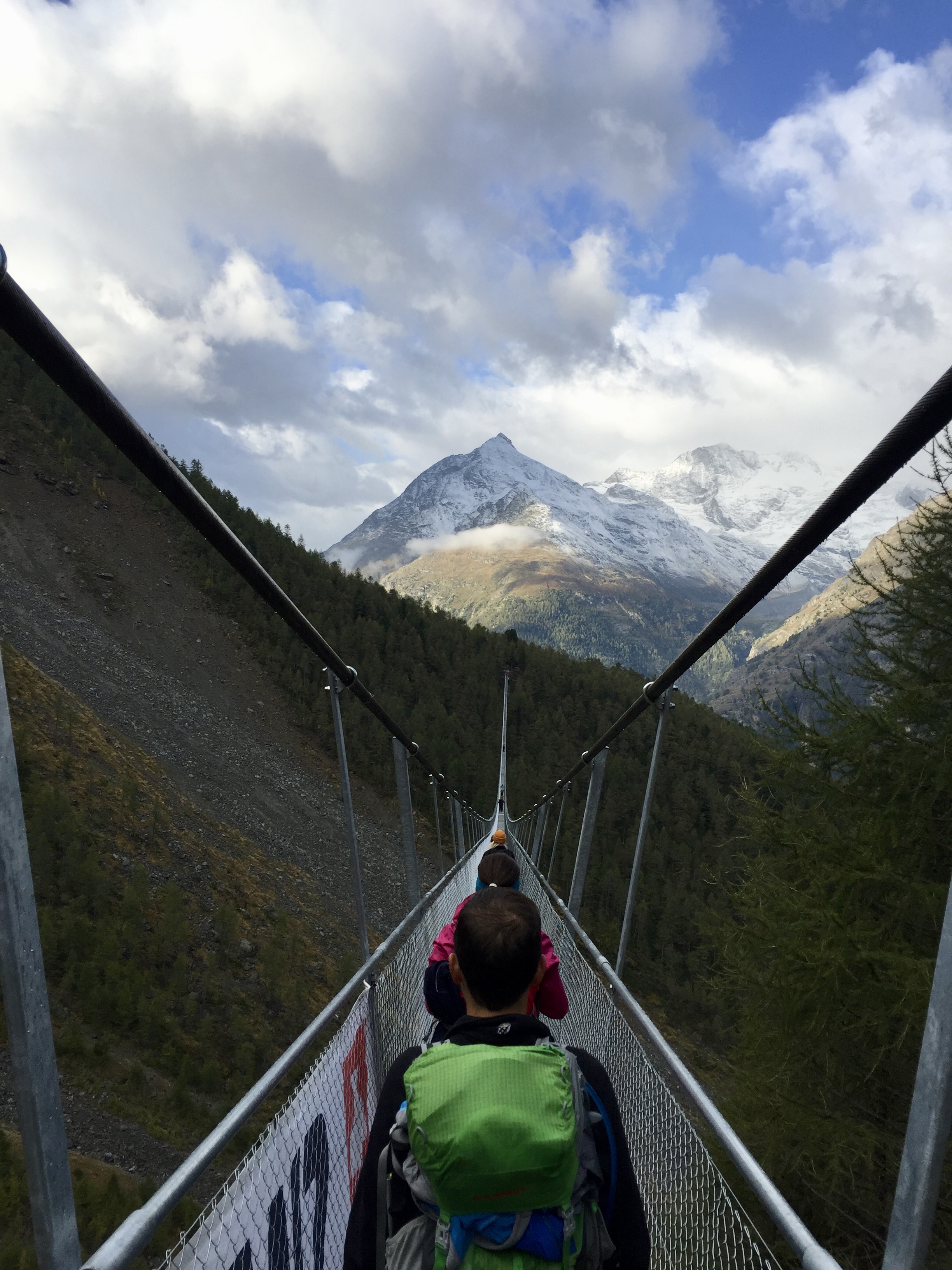 Swinging between mountains on the World’s longest suspension bridge ...